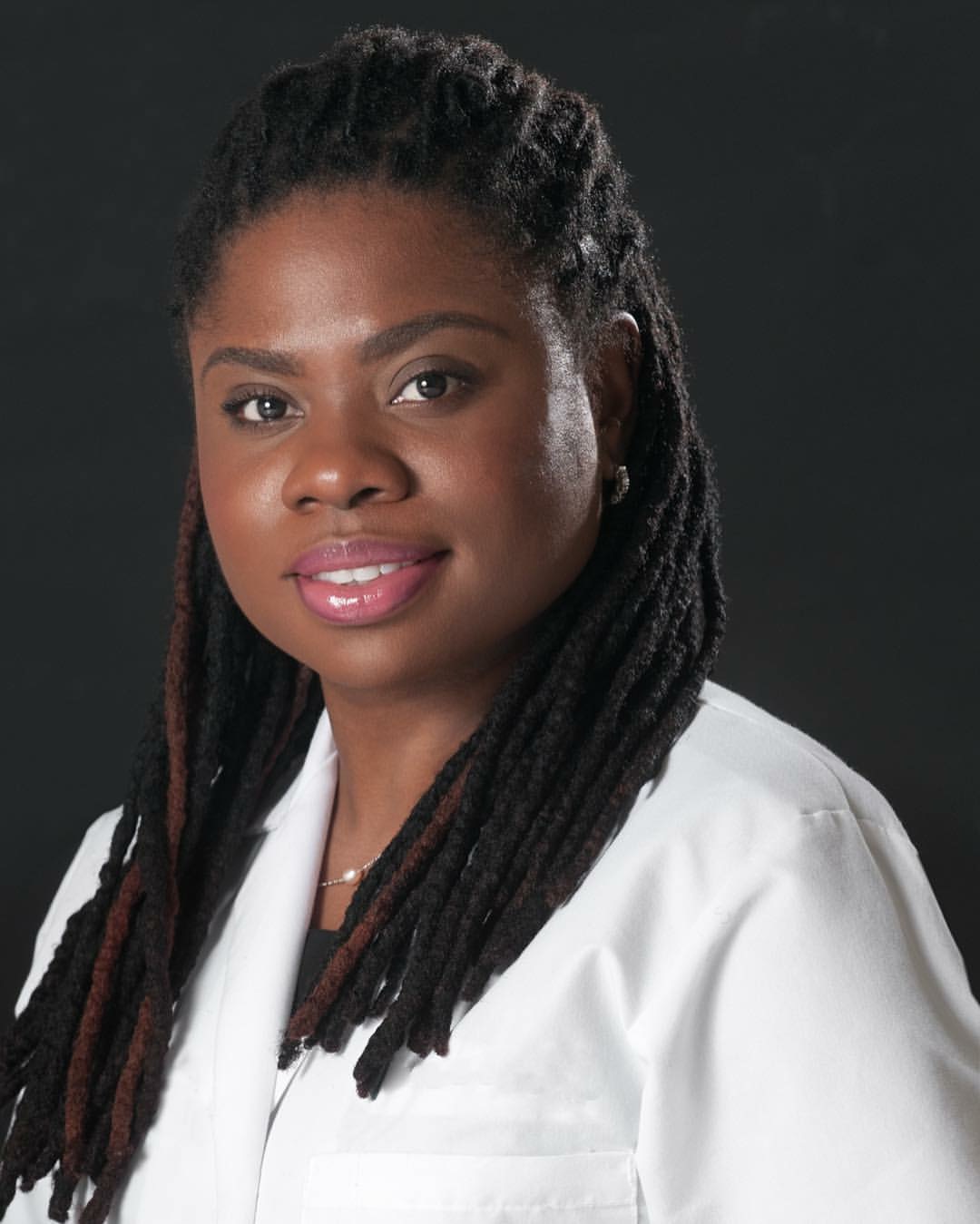 About - Dr. Gina Charles